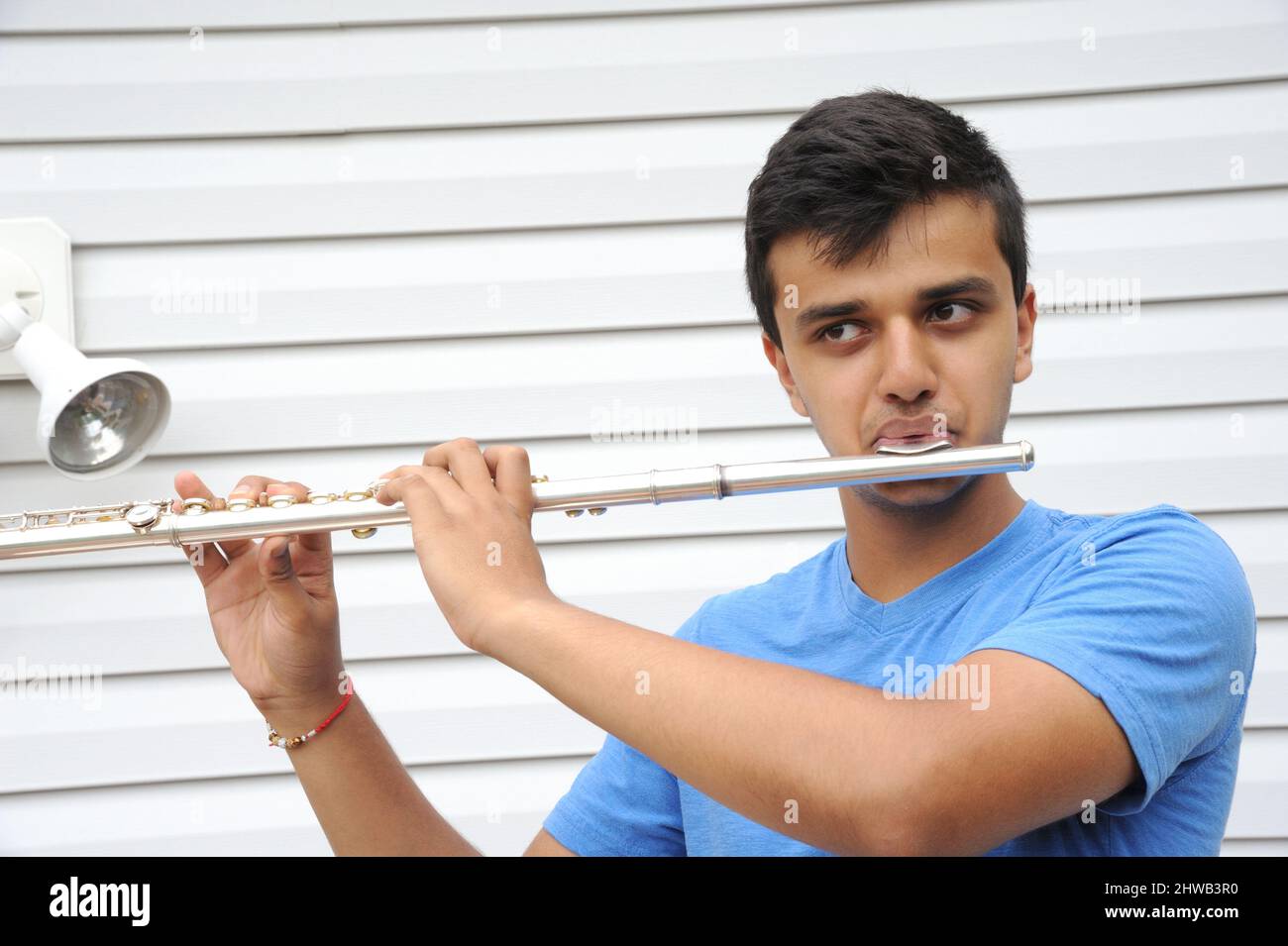 Mumbai Aug 17 2018 Indian Asian young flute music playing professional ...