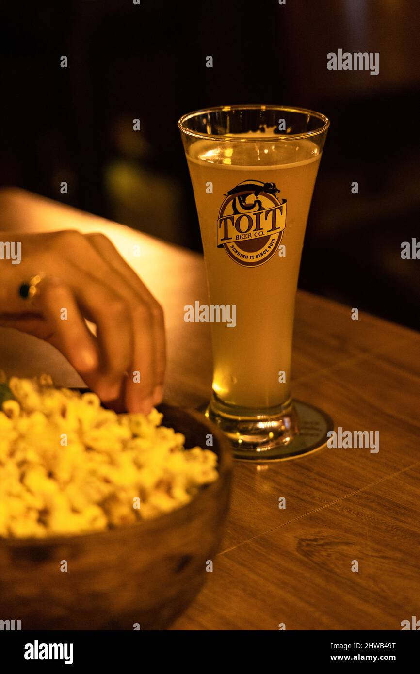 Half Pint of Toit Tint-In-Wit Beer along with Popcorn at Toit Brewpub ...