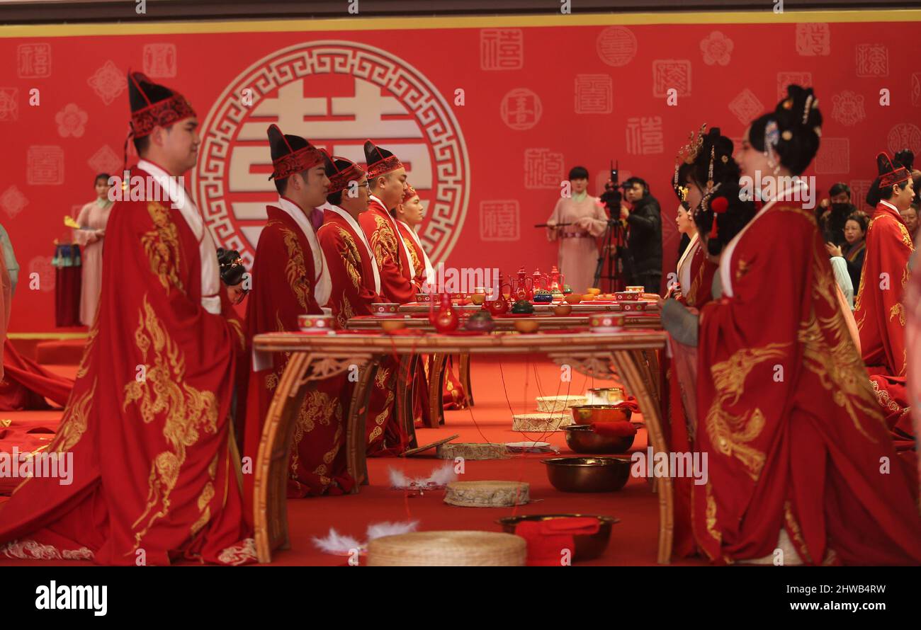 GUIYANG, CHINA - MARCH 5, 2022 - Twenty couples wearing traditional Han ...