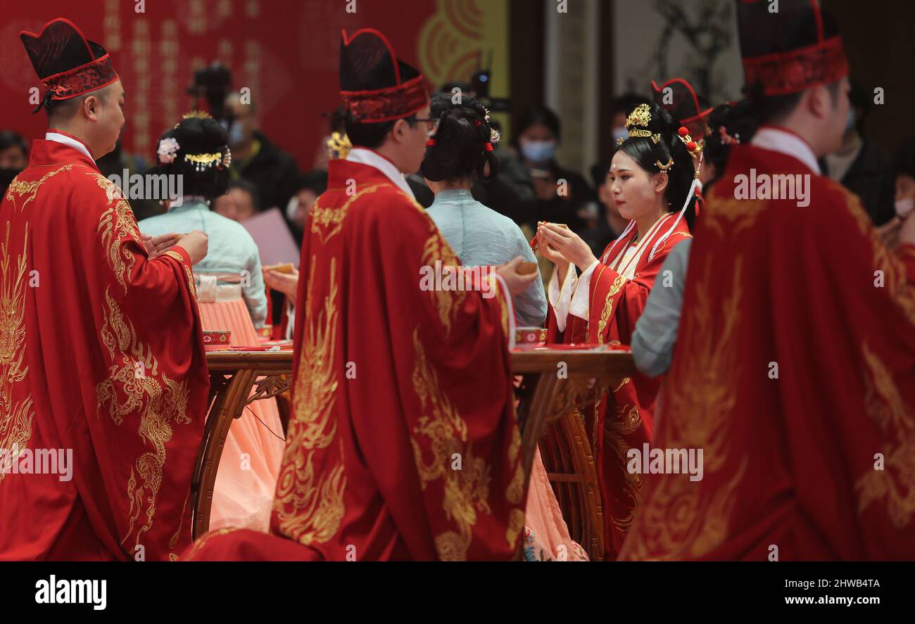 GUIYANG, CHINA - MARCH 5, 2022 - Twenty couples wearing traditional Han ...