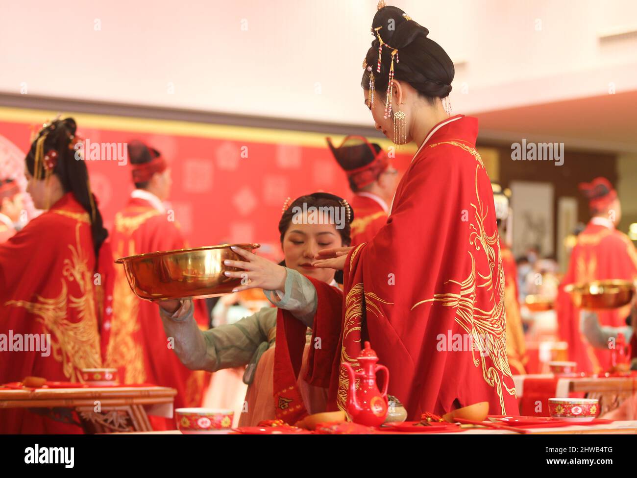 GUIYANG, CHINA - MARCH 5, 2022 - Twenty couples wearing traditional Han ...