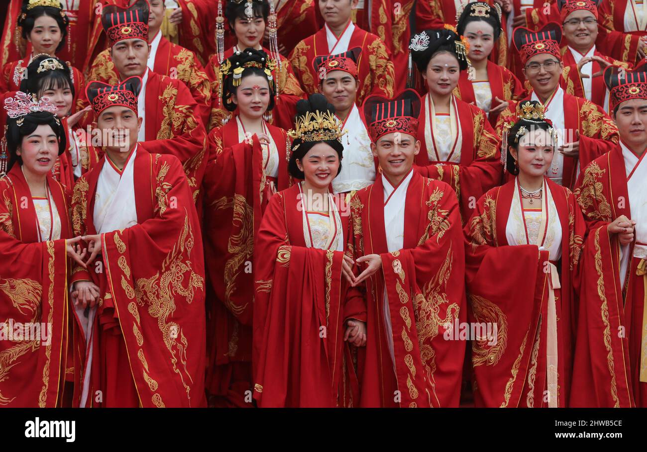 GUIYANG, CHINA - MARCH 5, 2022 - Twenty couples wearing traditional Han ...