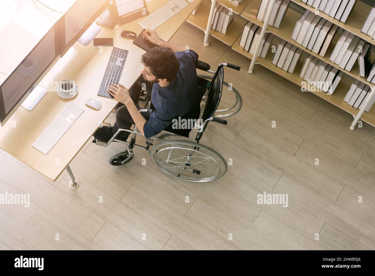 Top view handicapped and disability business man sitting on wheelchair ...