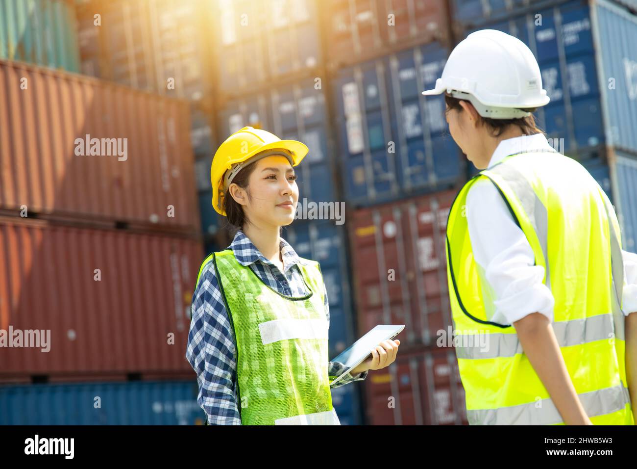 product inspection department working and check on tablet for stock in ...