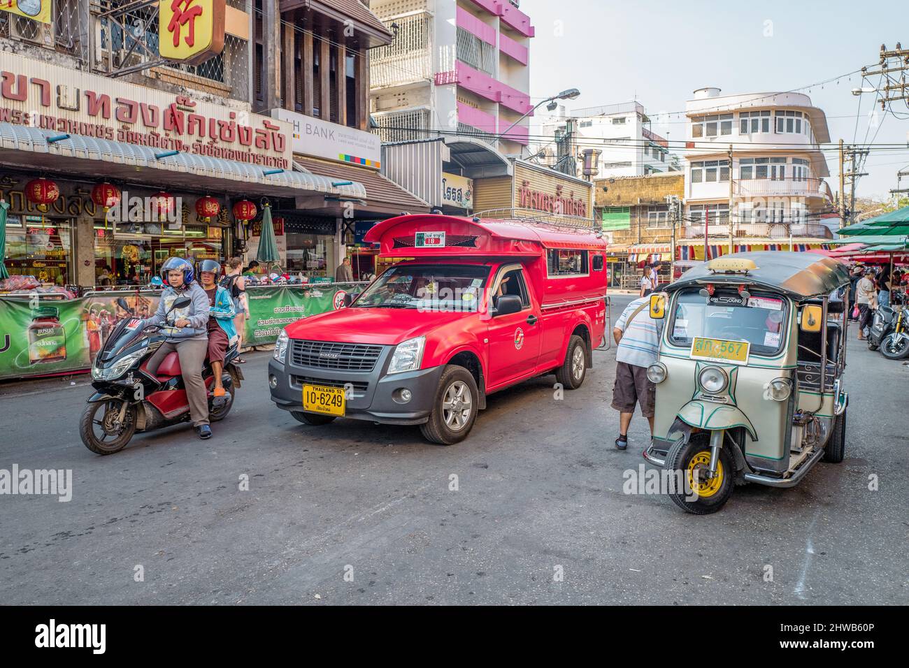 Traditional red songthaew in Chiang Mai. This ancient town is a popular ...