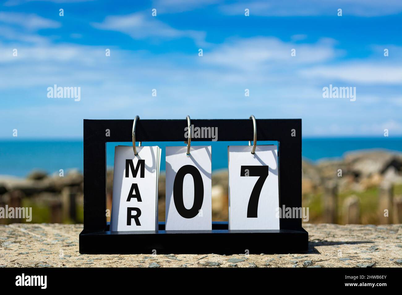 Mar 07 calendar date text on wooden frame with blurred background of ...