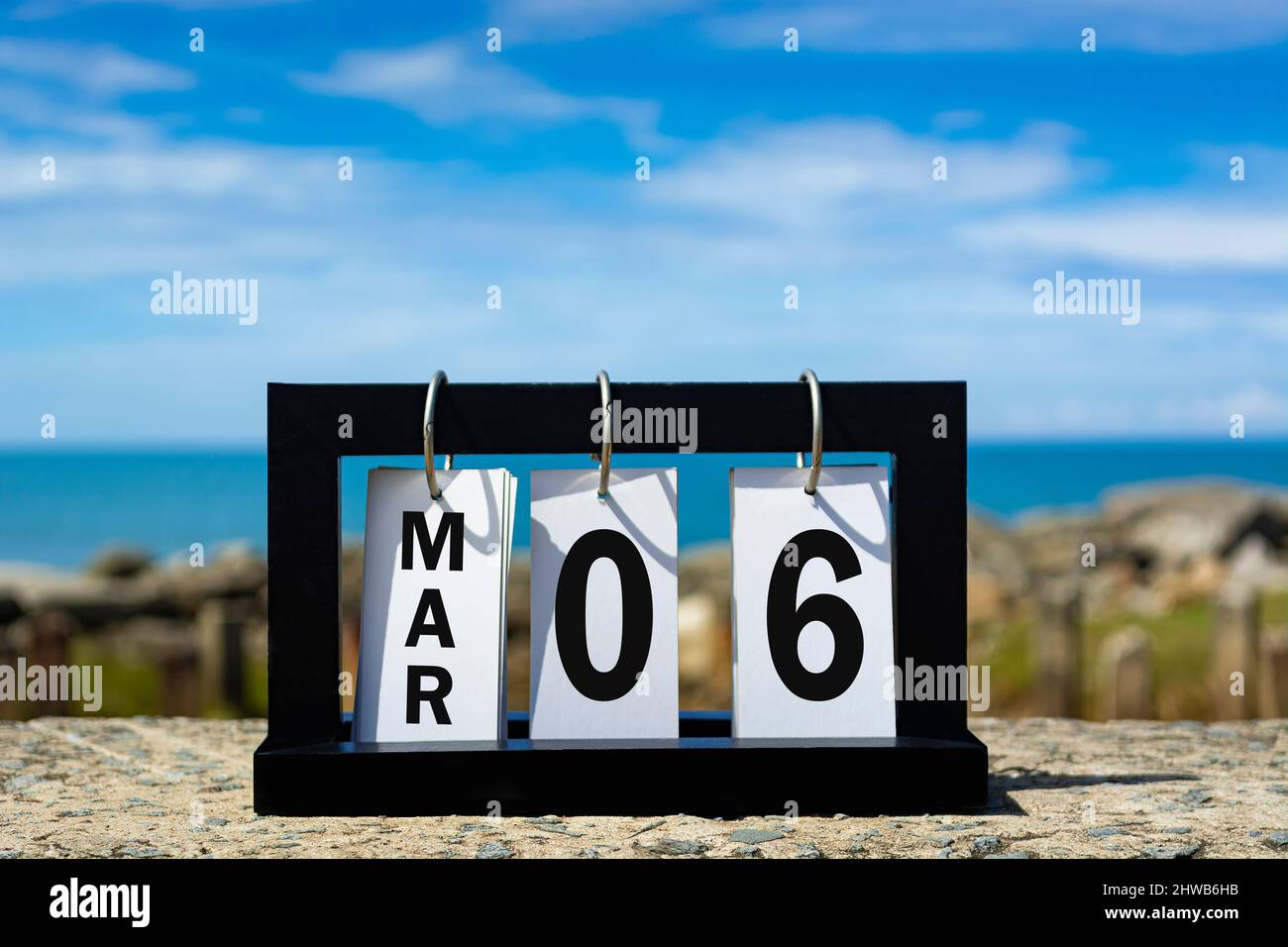Mar 06 calendar date text on wooden frame with blurred background of ...