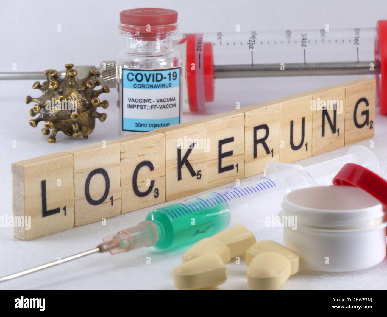 Symbolic image for the end of a pandemic with the letters easing Stock ...