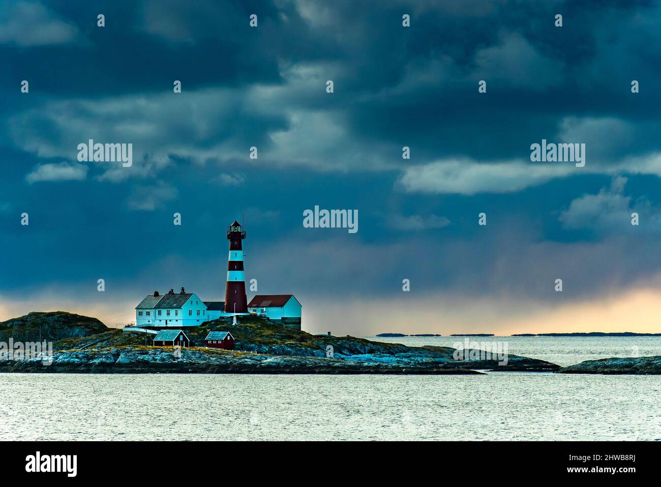Lighthouse in Norway, near from Bodø. a storm front moves in over the ...