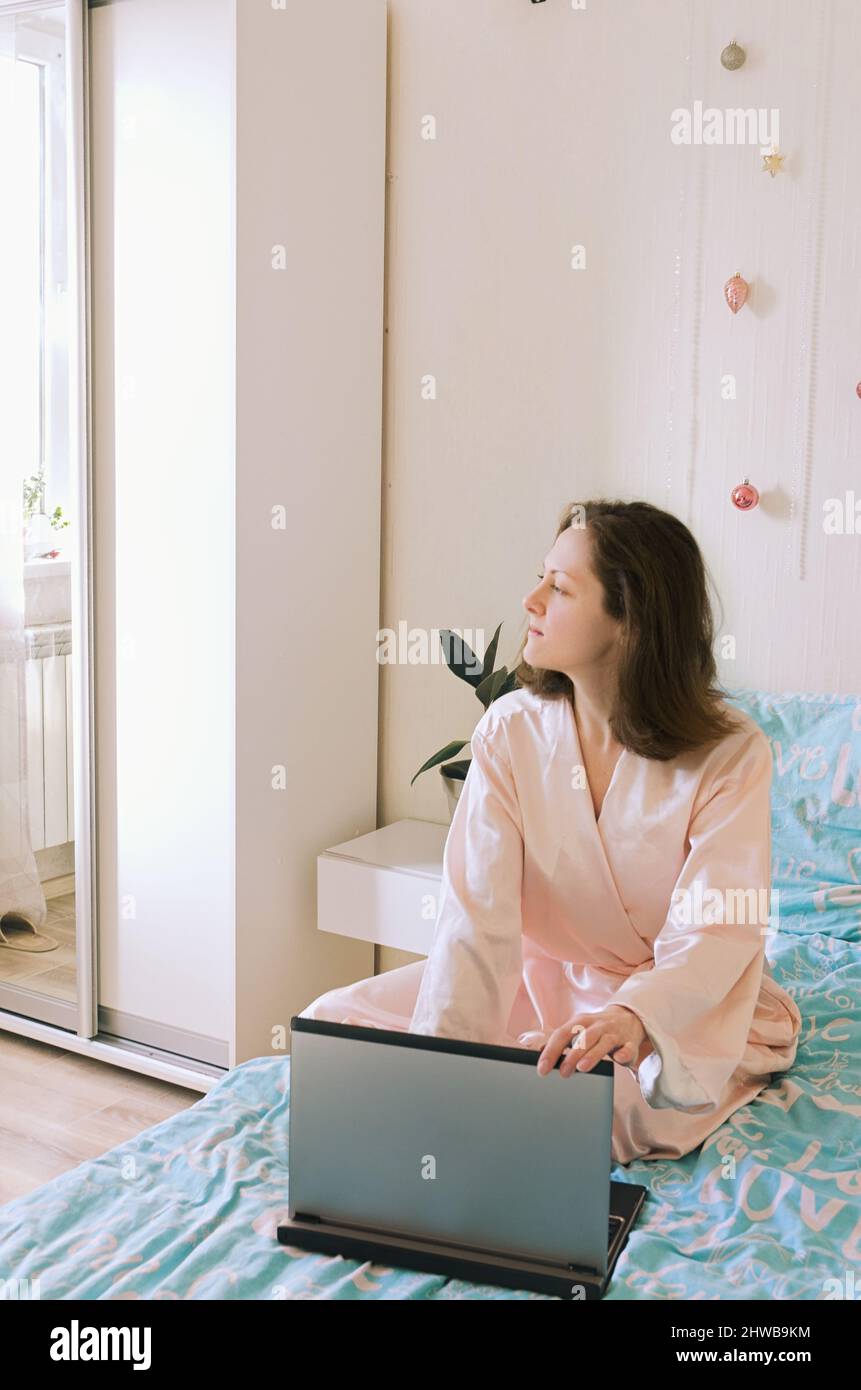 Working at home in pajamas hi-res stock photography and images - Alamy