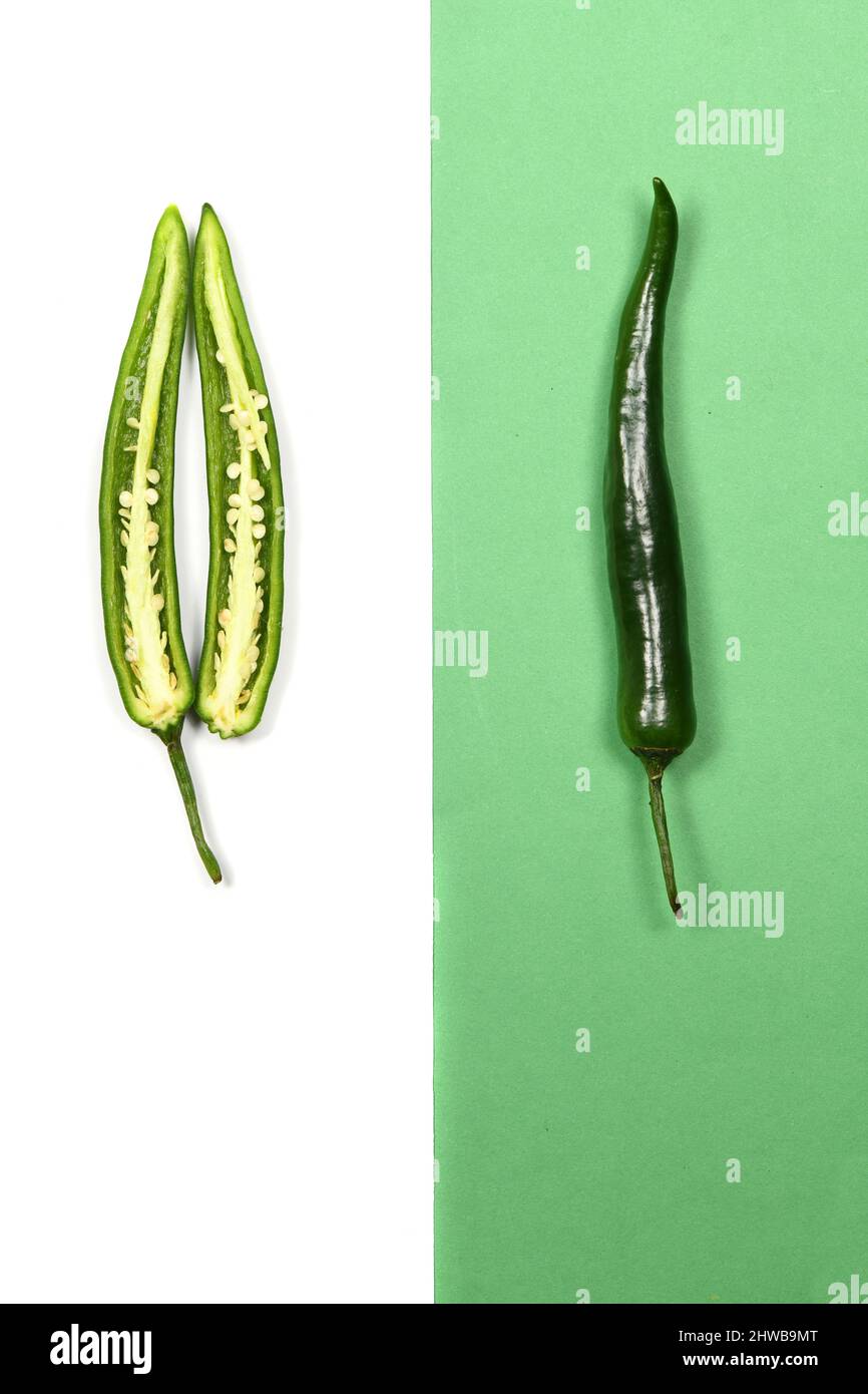 Creative layout made of green chili pepper. High resolution photo. Full ...