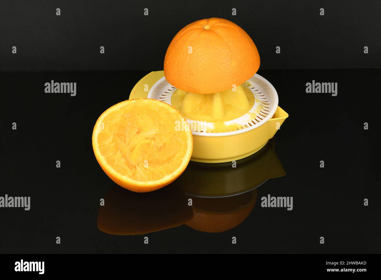 Perfectly retouched orange isolated on acrylic black background. High ...