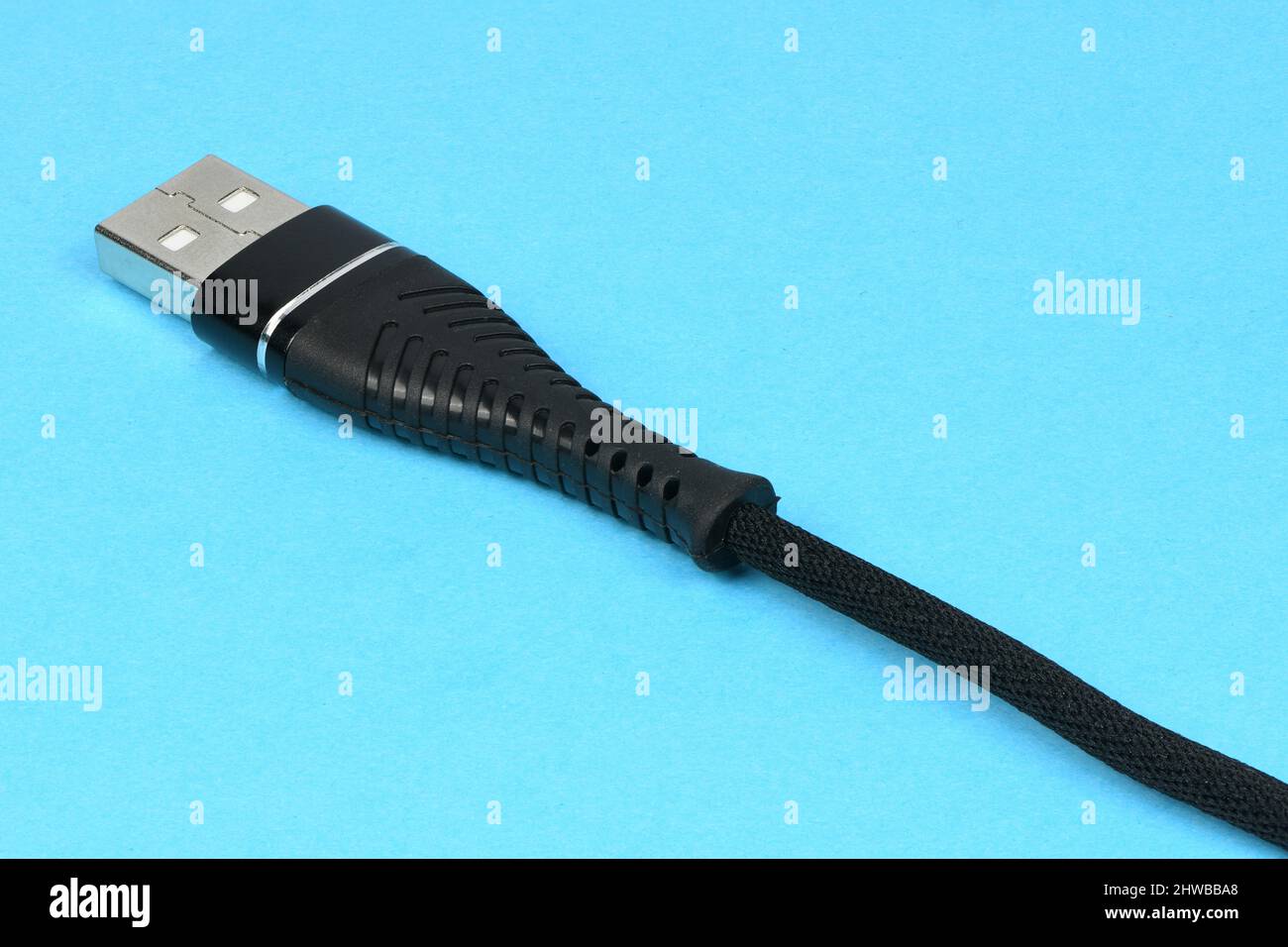 Closeup of an USB connector isolated on blue. High resolution photo ...