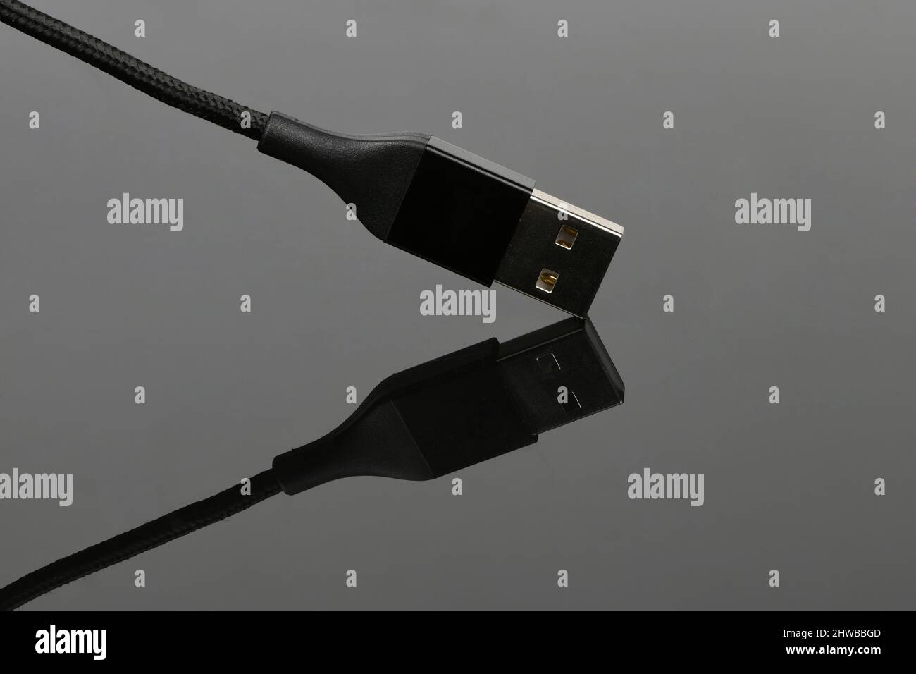 Closeup of an USB connector on black acrylic background. High ...