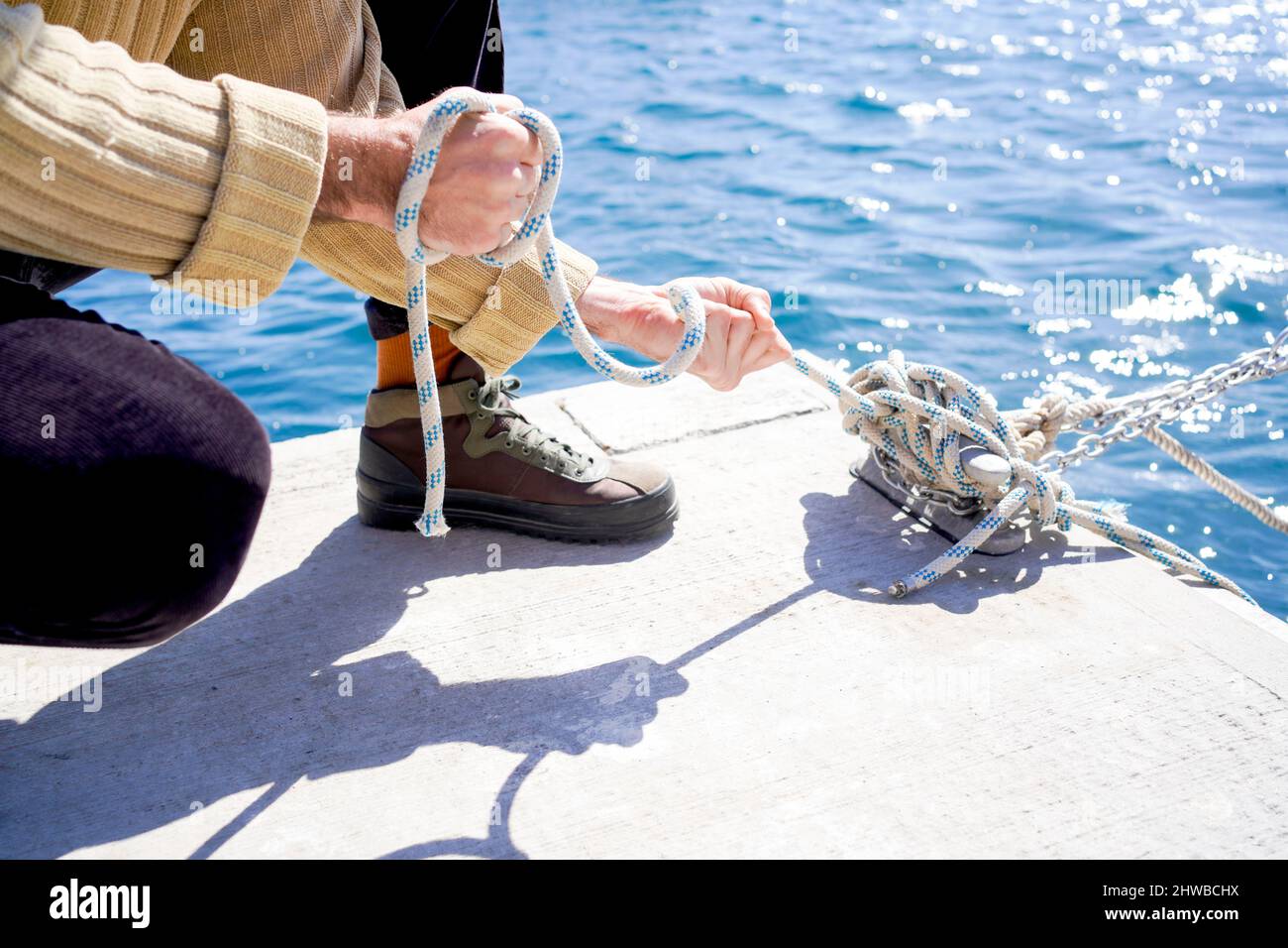 Hands tied with rope hi-res stock photography and images - Alamy