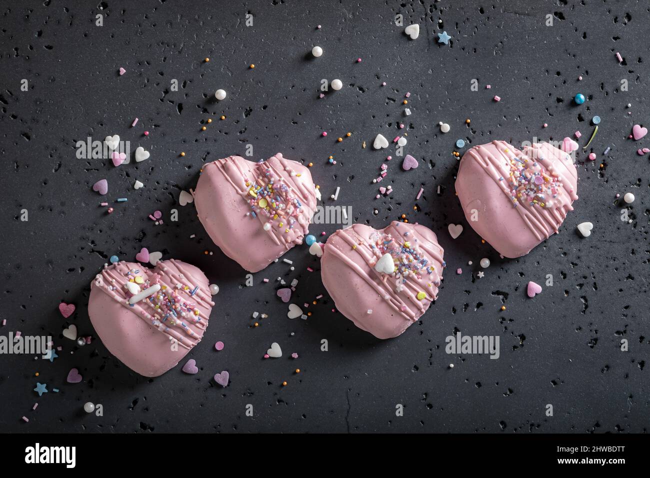 Romantic valentine mono portion with heart shape and sprinkles. Pink ...