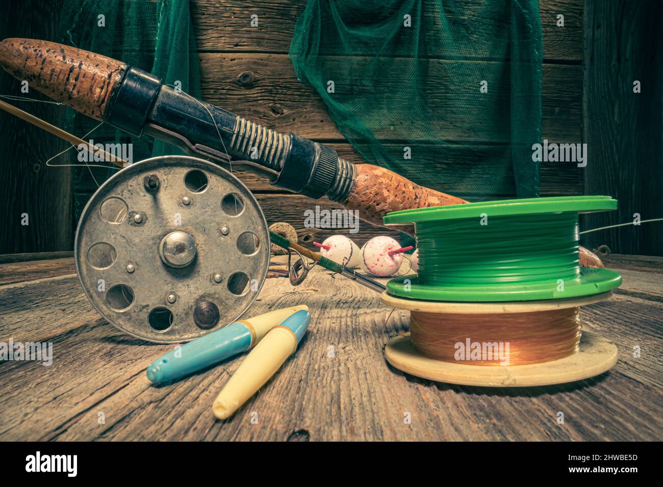 Retro angler equipment with floats, rods and hooks Stock Photo - Alamy