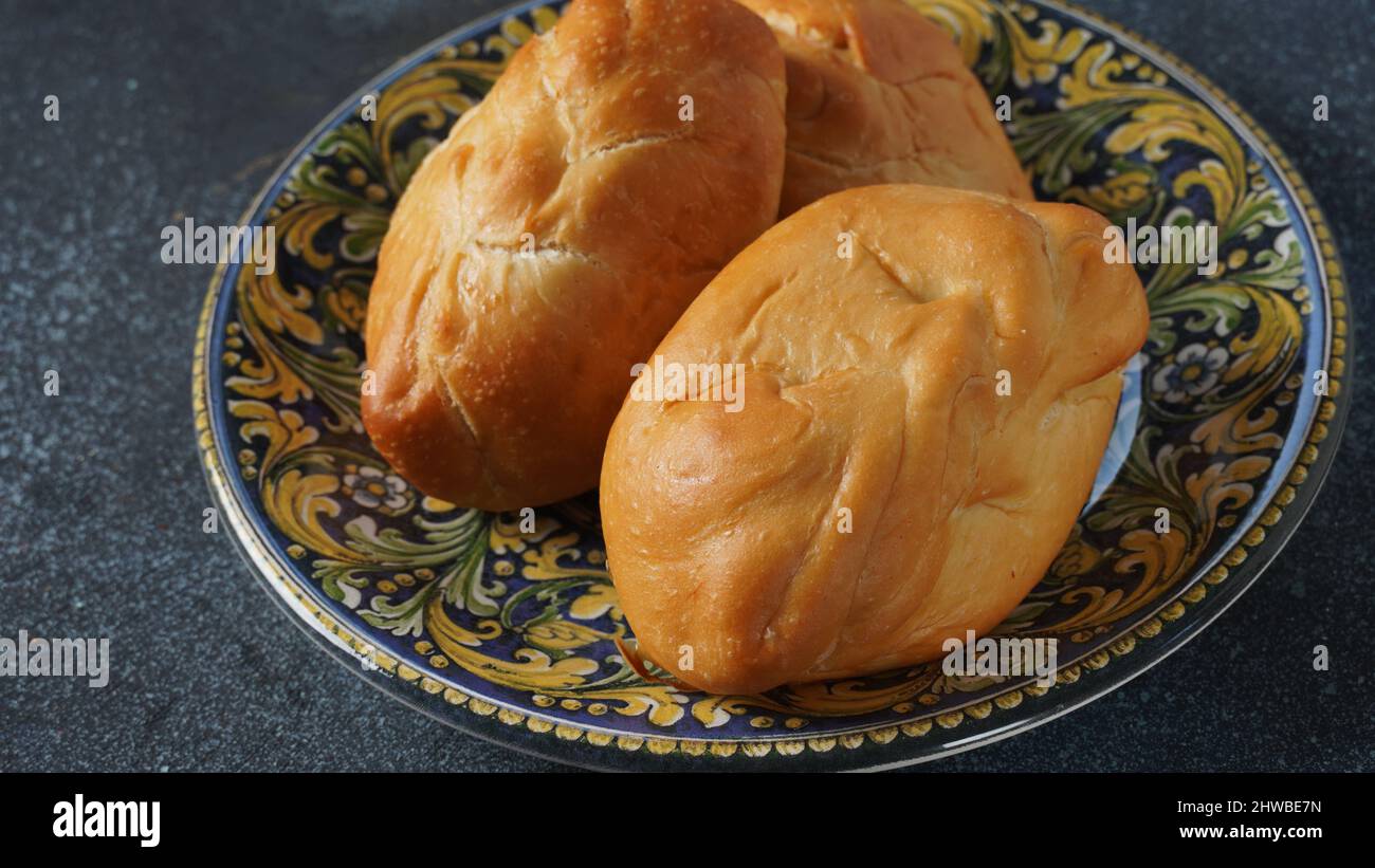 Ukrainian Patties (Pasties, Hot Cakes, Pirozhki, Pies) on a plate ...