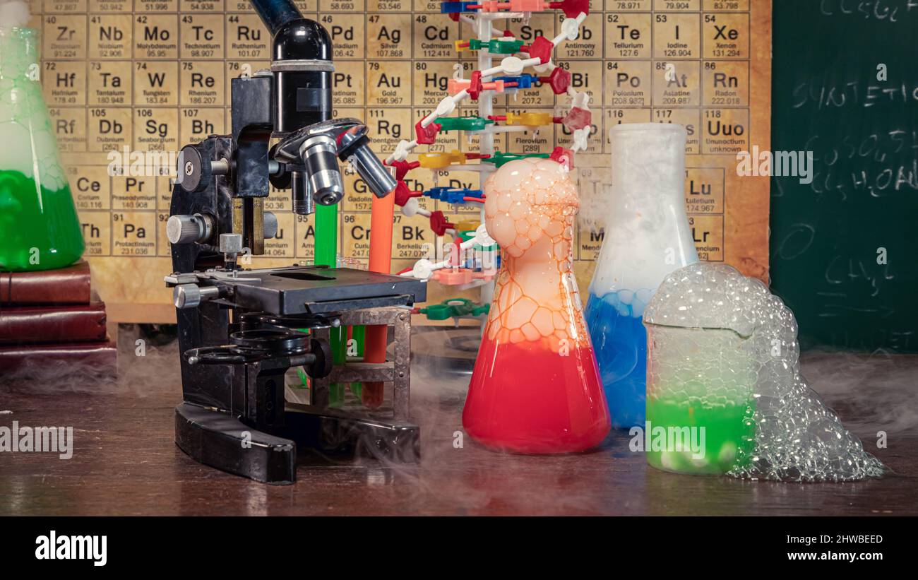 Chemical tests in academic laboratory with beakers. Chemistry classes ...