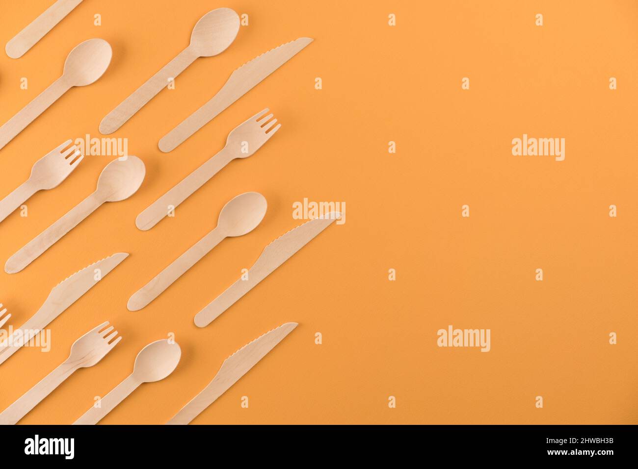 Flat lay with natural wooden cutlery set made of natural bamboo ...