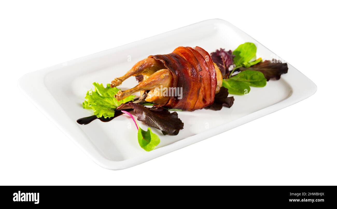 Image of delicious wrapped in bacon baked quail served on plate ...