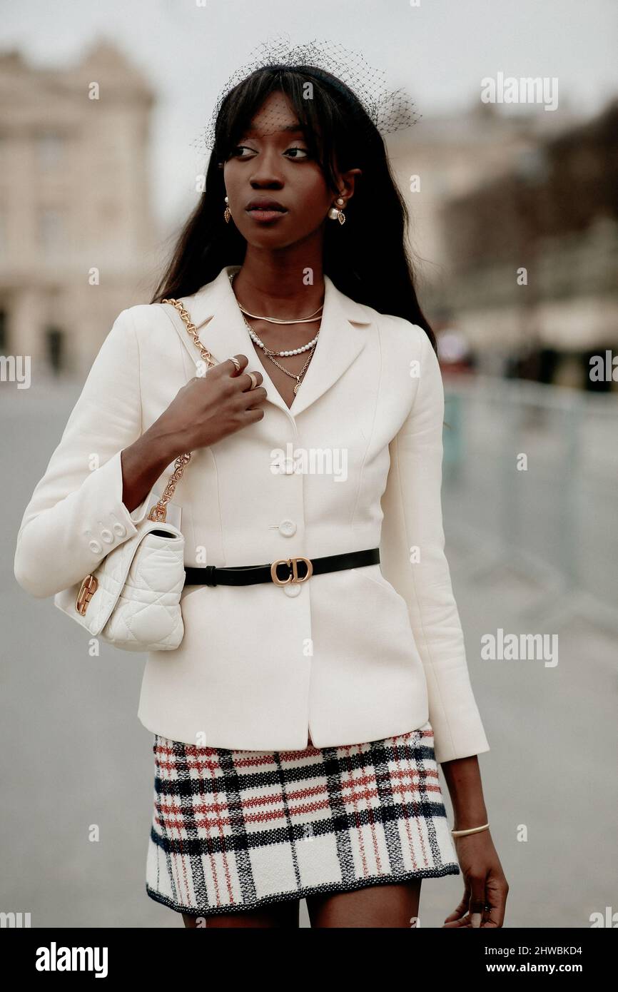 Street style, Emmanuelle Koffi arriving at Dior Fall-Winter 2022-2023 show, held at Jardin des ...