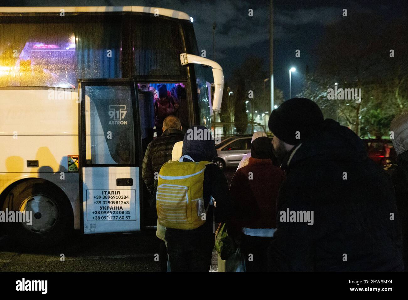 Ukrainian people are welcomed by family or friends, in front of Roma ...