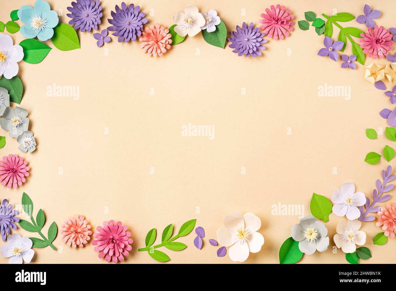 Flat lay of floral background with handmade paper flowers and ...