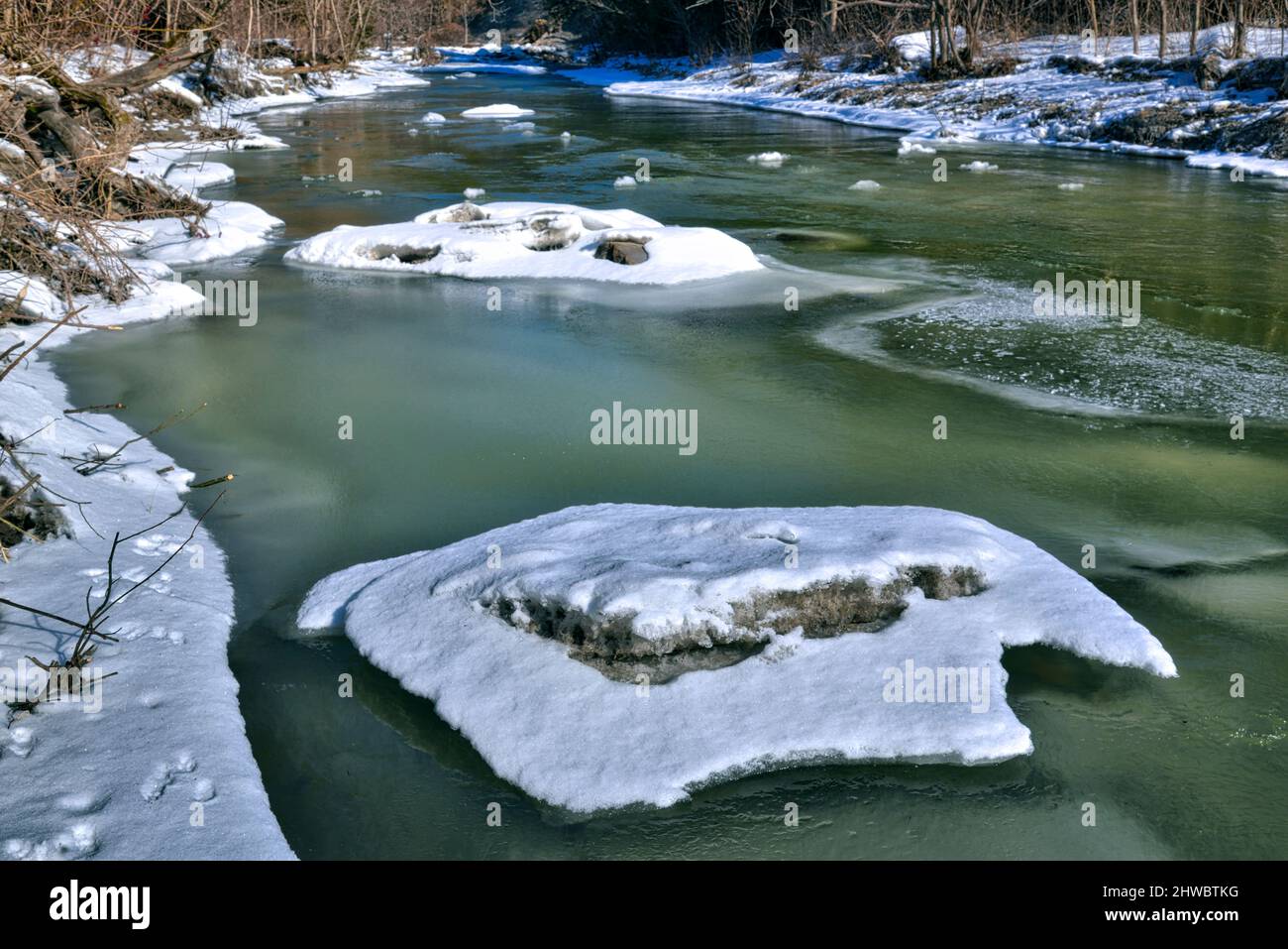 Winter Landscape. Icy river in the river valley Stock Photo - Alamy