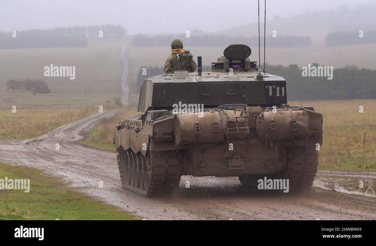 british army challenger 2 main battle tank in action on exercise on Salisbury Plain military ...