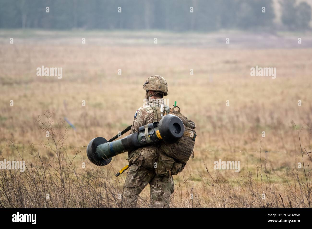 British army soldier completing an 8 mile combat fitness test tabbing ...