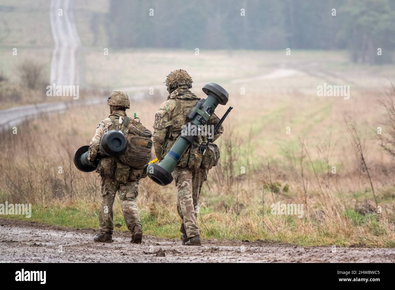 British army soldiers completing an 8 mile combat fitness test tabbing ...