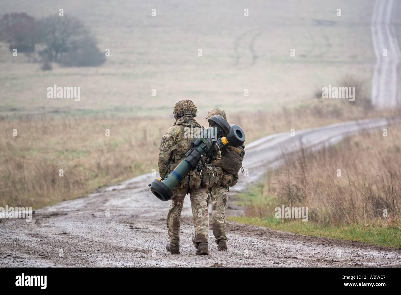 British army soldiers completing an 8 mile combat fitness test tabbing ...