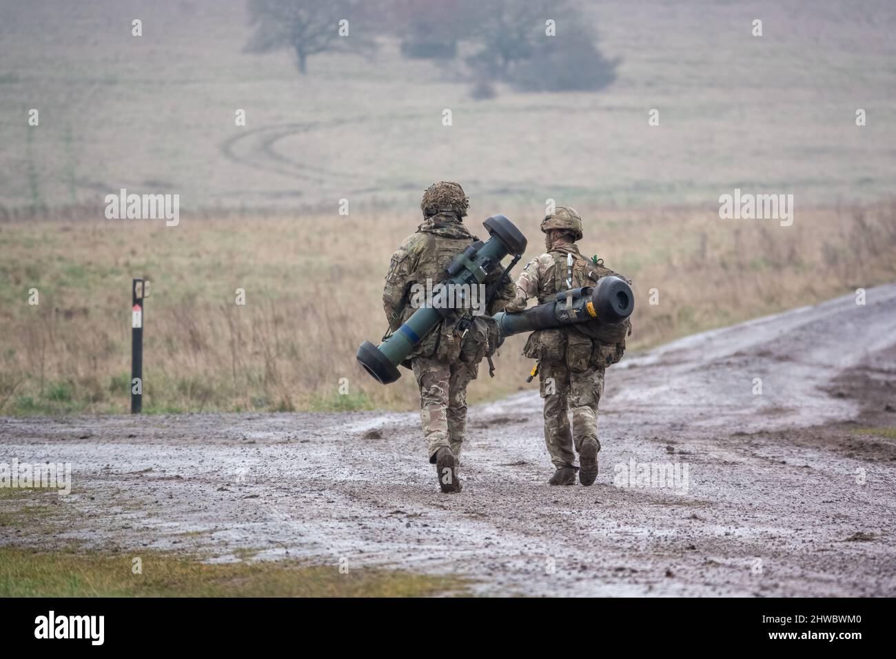 British army soldiers completing an 8 mile combat fitness test tabbing ...