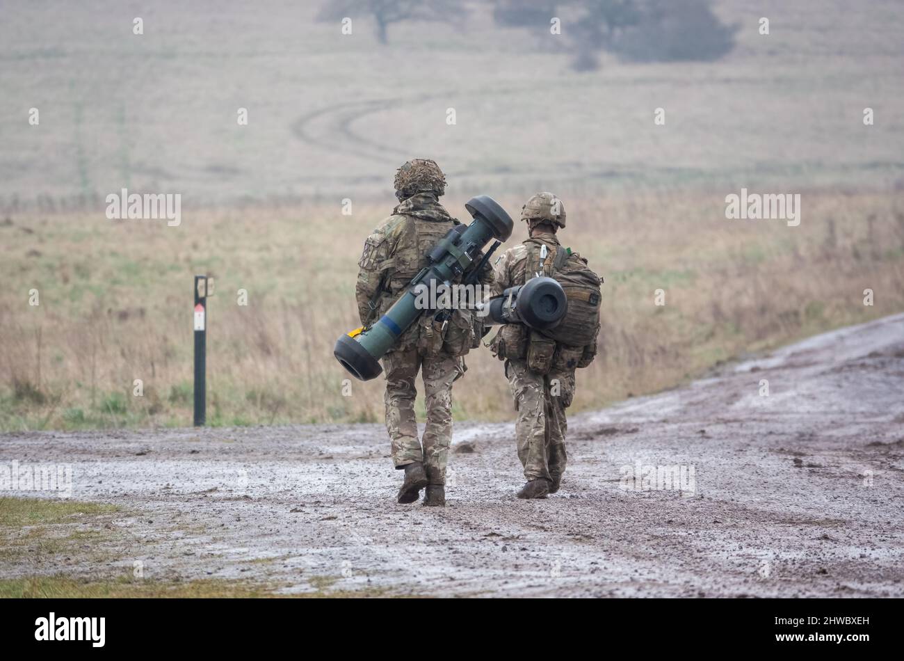 British army soldiers completing an 8 mile combat fitness test tabbing ...