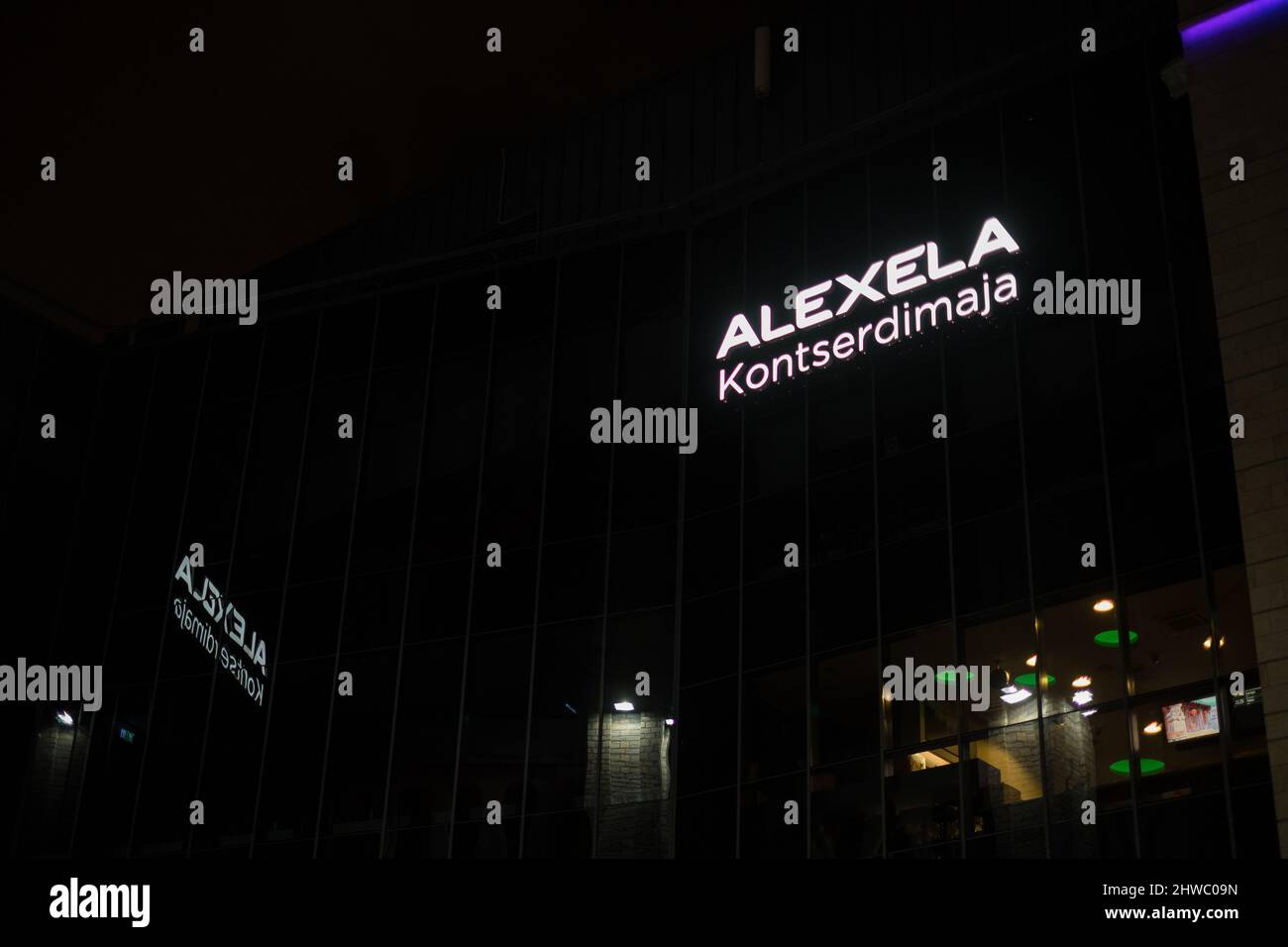 Alexela concert hall building light sign at night. Alexela ...
