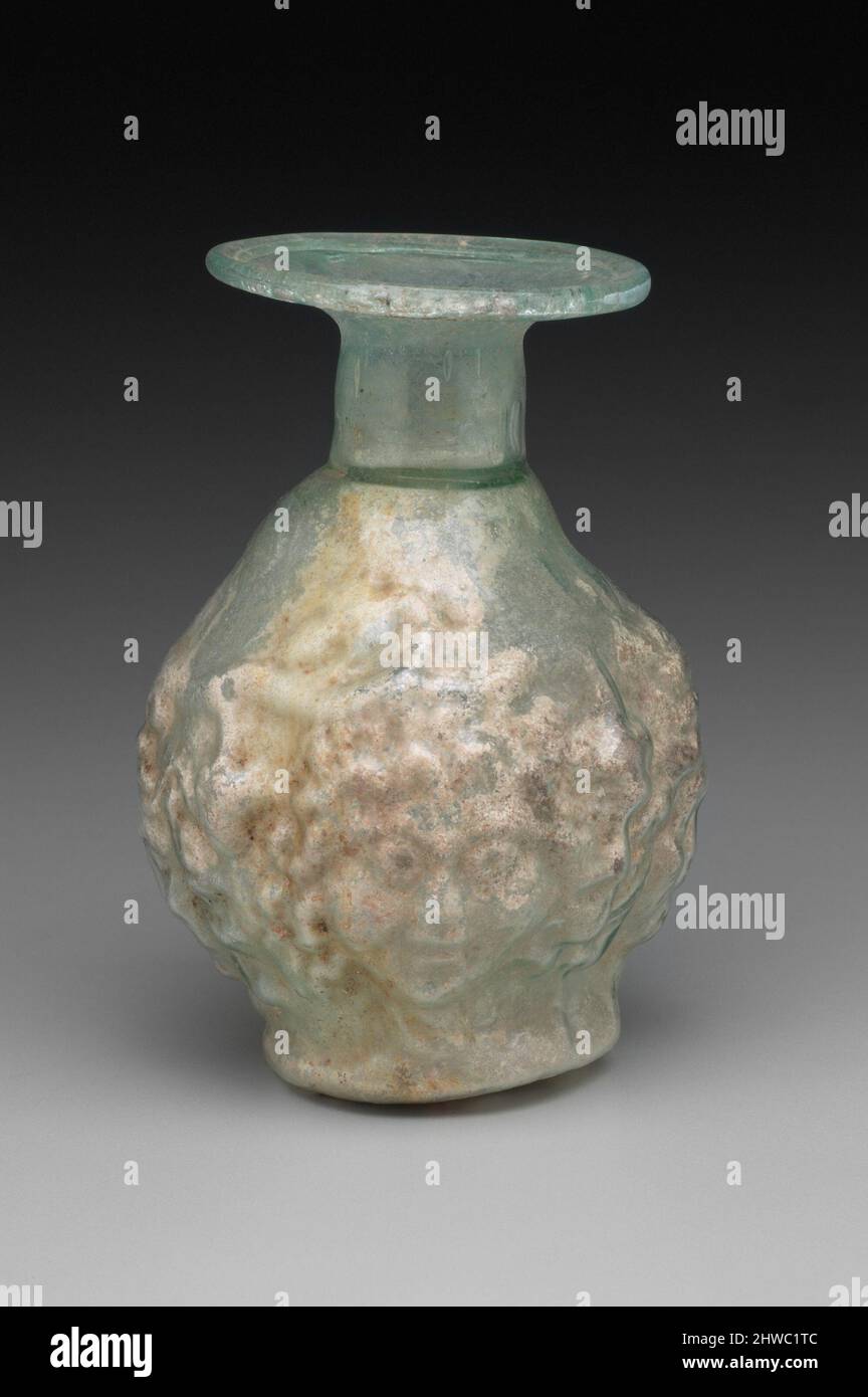 Head Flask with Four Faces Stock Photo - Alamy