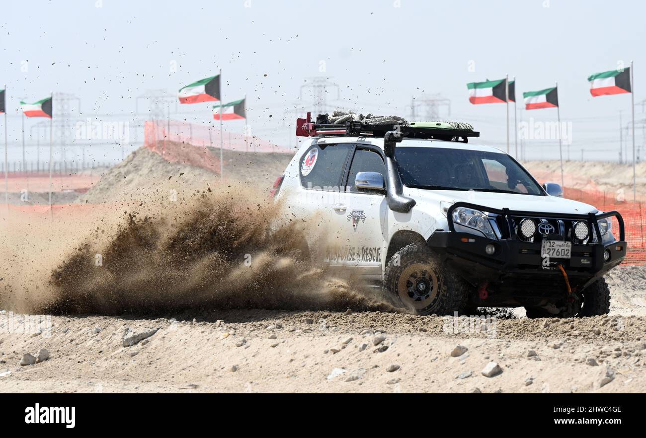Jahra Governorate, Kuwait. 5th Mar, 2022. Rakan Hamad steers the car ...
