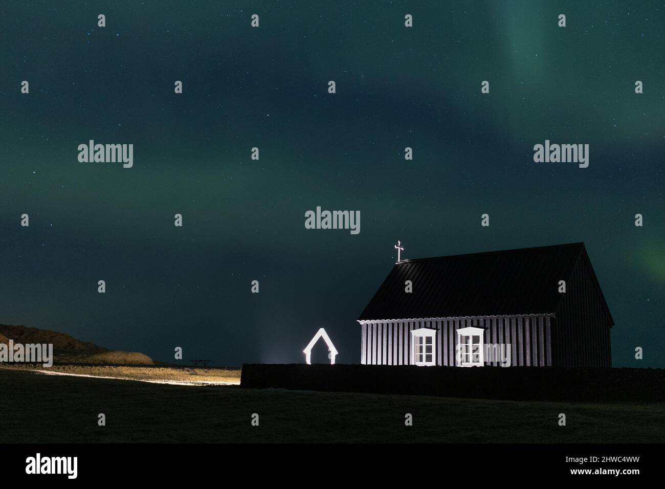 Aurora borealis over church hi-res stock photography and images - Alamy