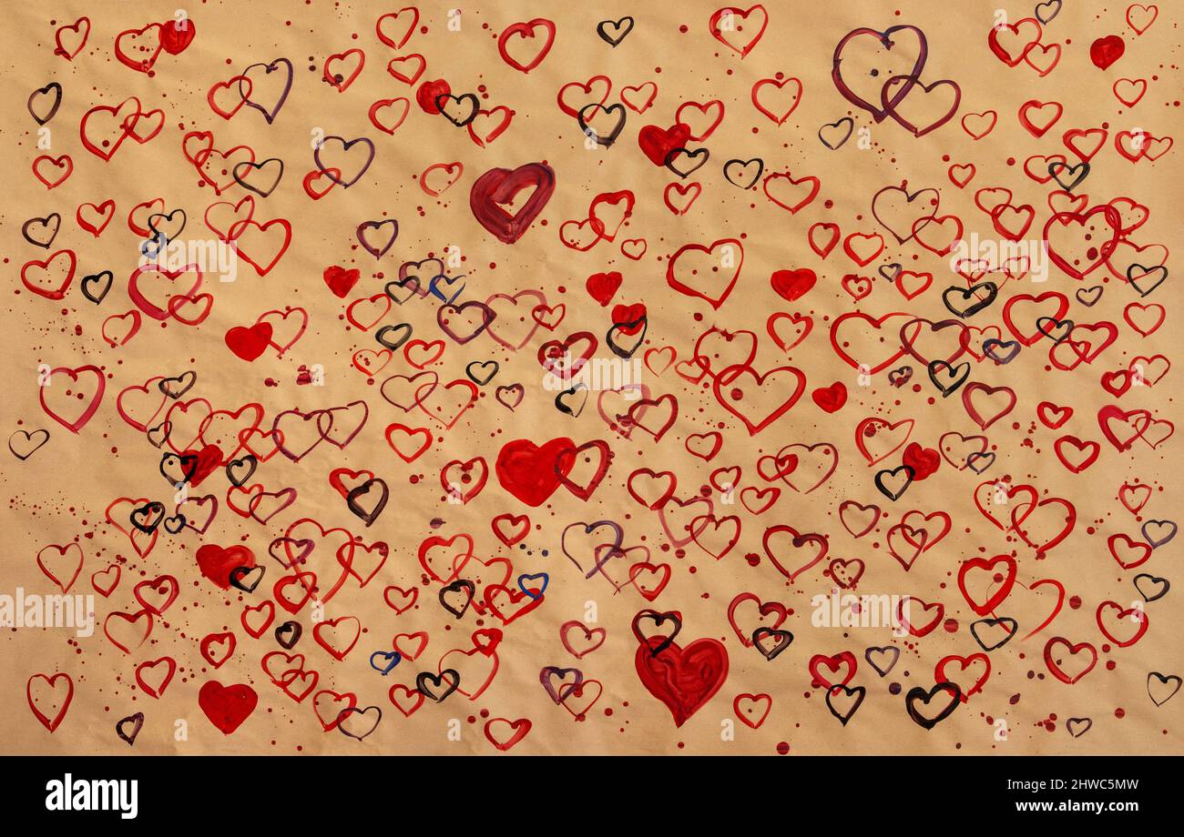 red hand painted hearts on crinkled wavy wrapping paper as valentines ...