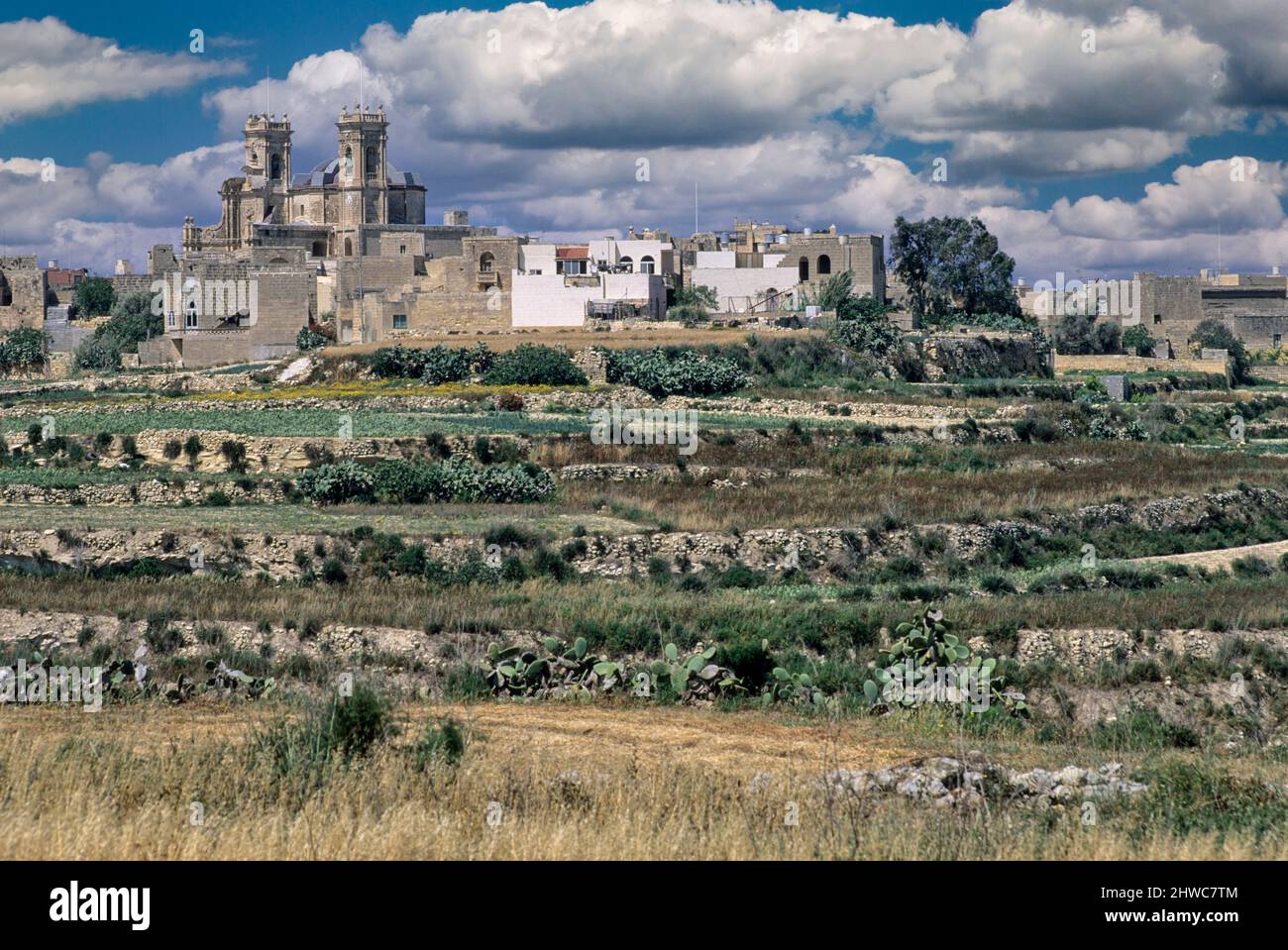 Gozo, Malta. Terraced farmland, village, and church Stock Photo - Alamy