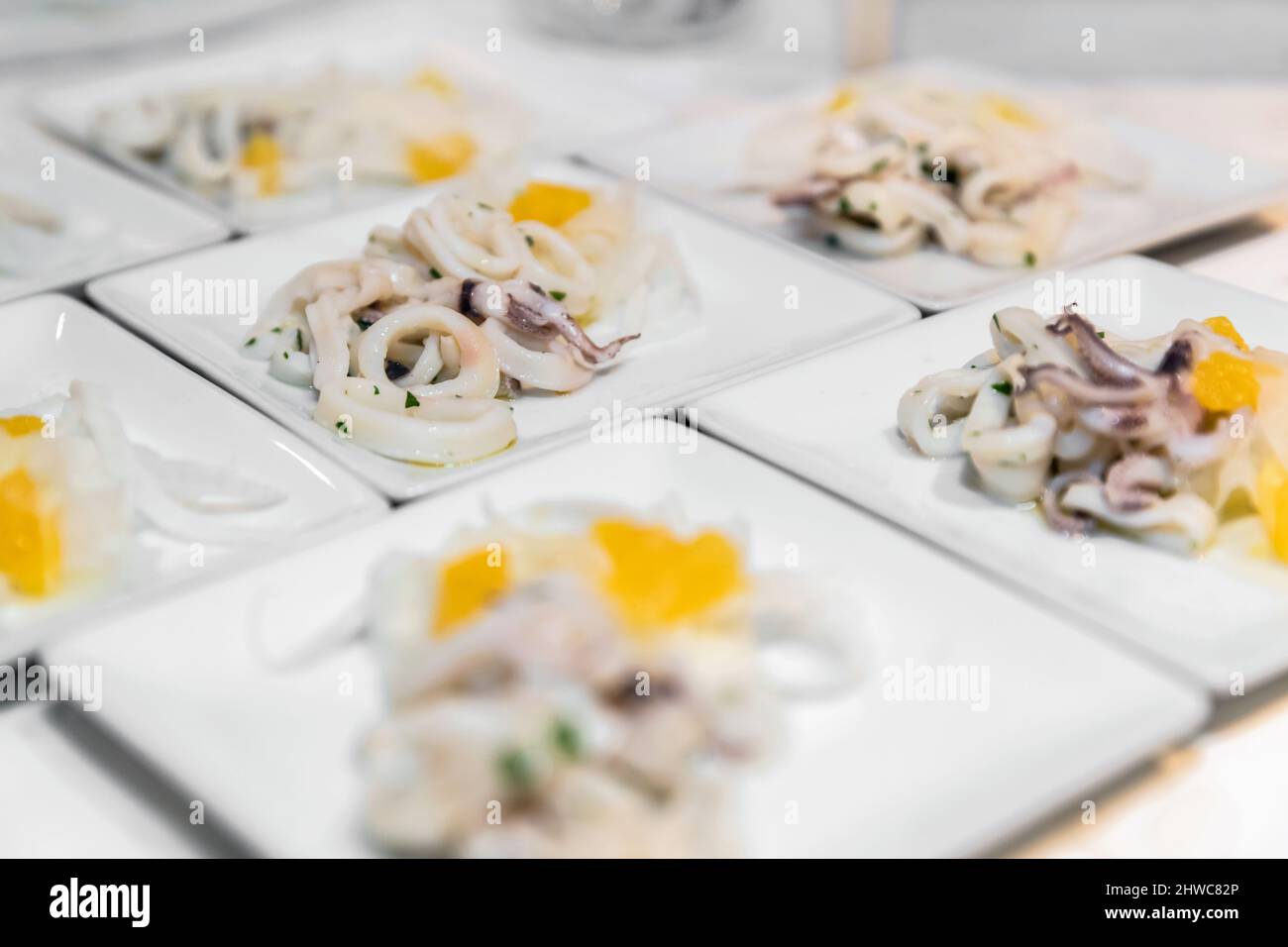 Fresh squid fish dishes, ready to be served to guests. Wedding ...