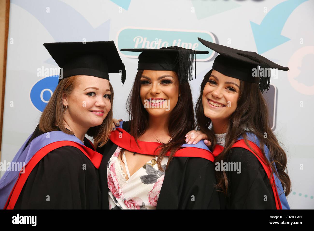 A three european female graduates posing for photographs at their ...