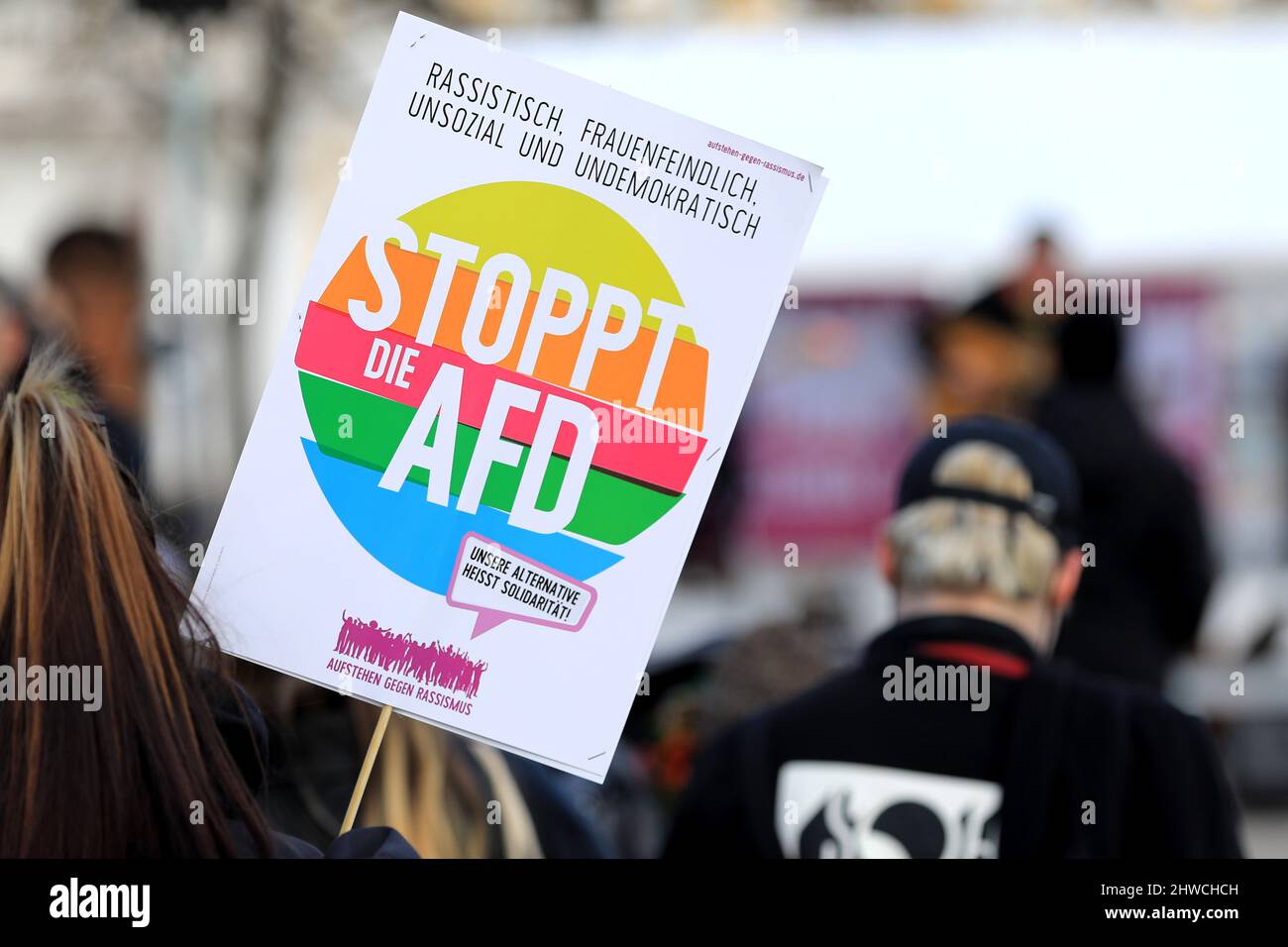 Magdeburg, Germany. 05th Mar, 2022. Participants with anti AfD posters ...