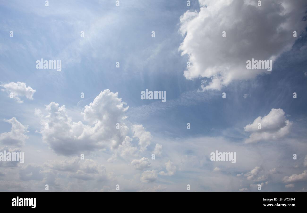Light blue sky with clouds Stock Photo - Alamy