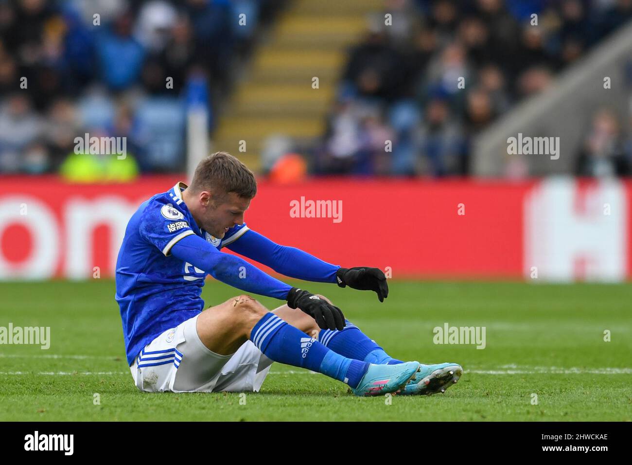 Jamie Vardy #9 of Leicester City sits on the pitch after appearing to ...