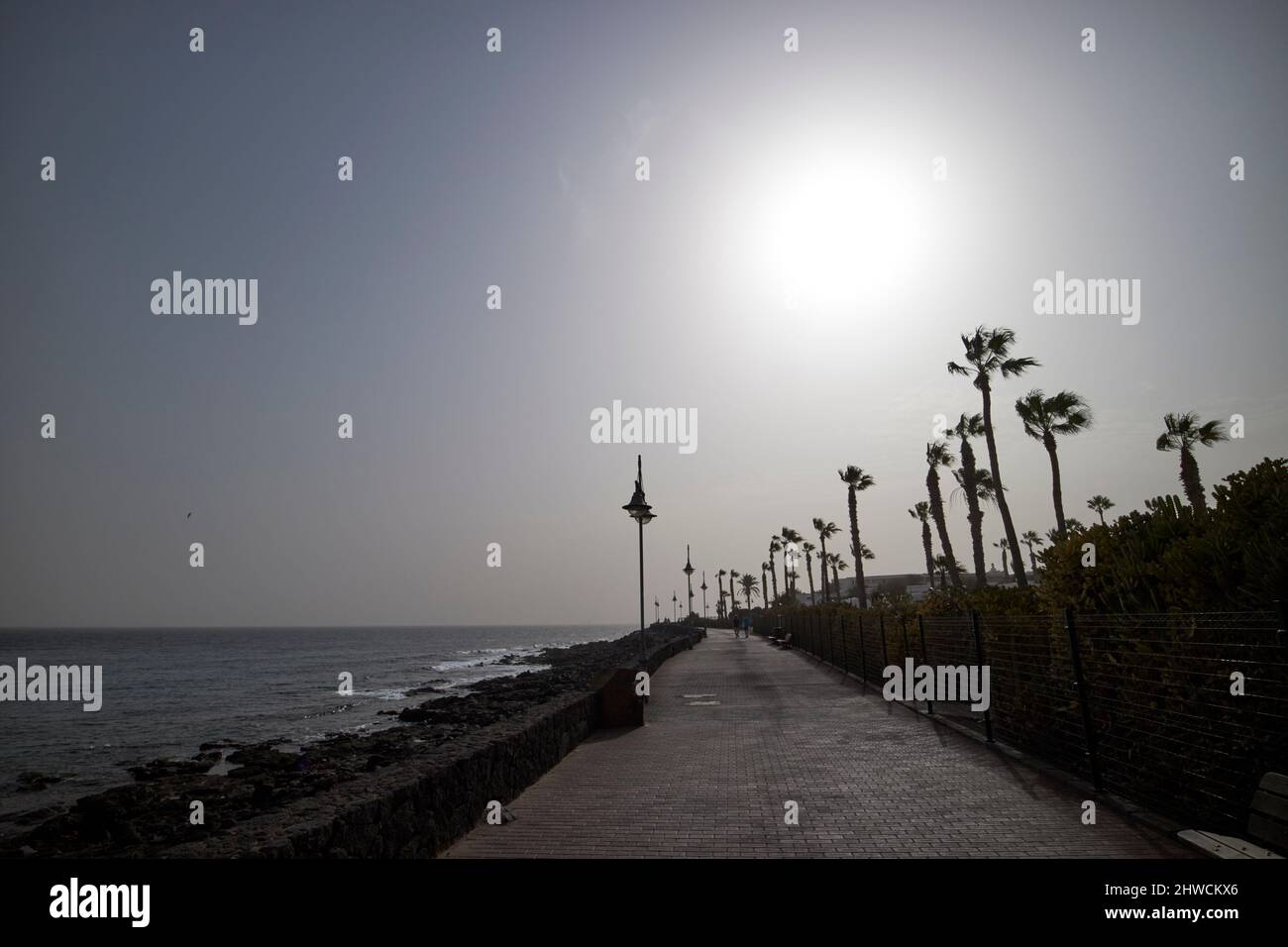 calima wind blowing in dust and sand clouding the sky and sun playa ...