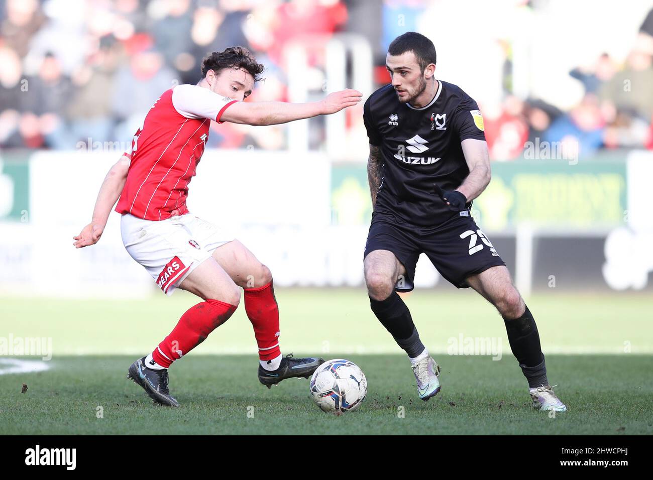 Rotherham United's Ollie Rathbone (left) and Milton Keynes Dons' Troy ...
