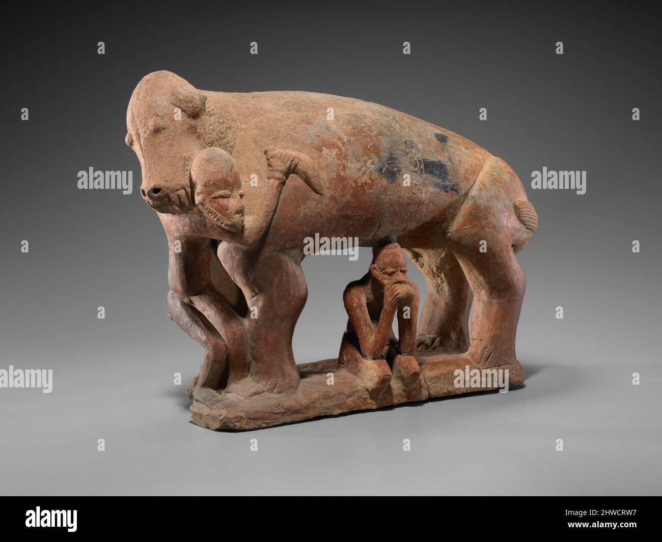 Quadruped with Two Human Figures Stock Photo - Alamy