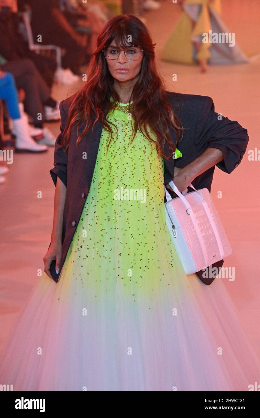 A model walks on the runway during Off - White Women and Men Ready to ...